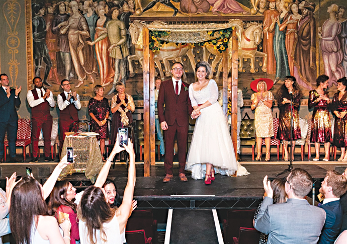 Couple who met behind scenes are married at theatre | Islington Tribune